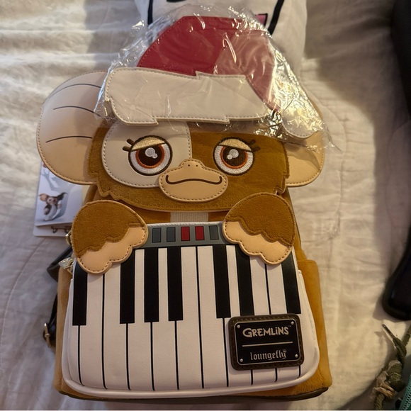 Loungefly | Bags | Loungefly Gremlins Gizmo Backpack | Poshmark